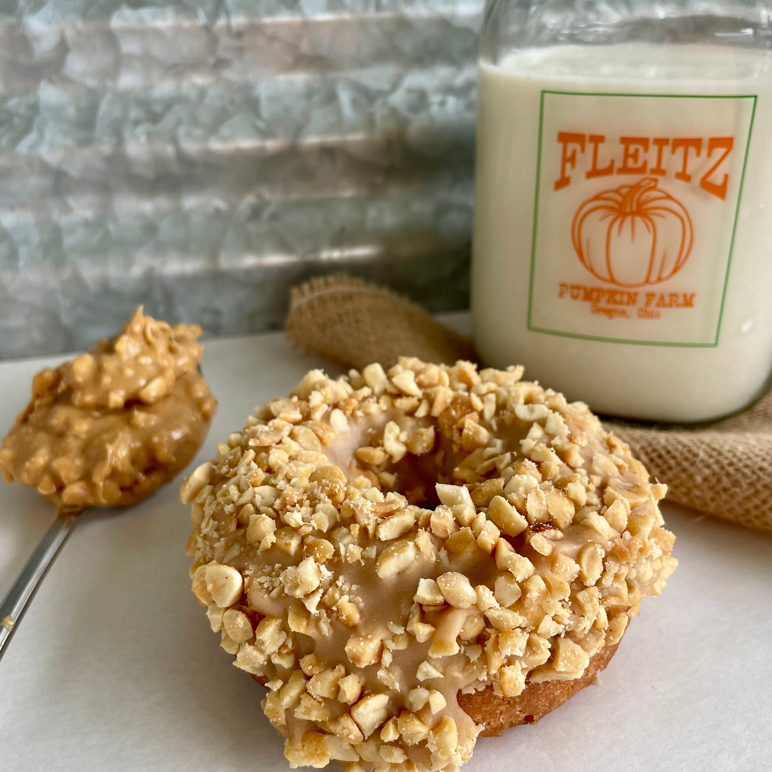 Single Vanilla Donut with Peanut Butter Frosting & Chopped Peanuts ...
